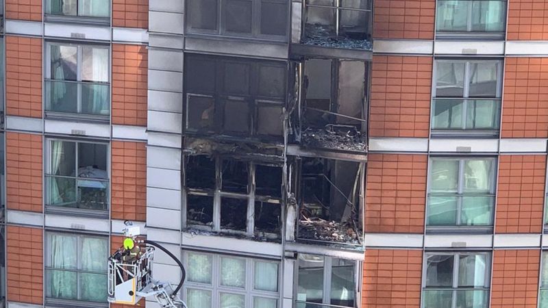 Poplar fire: London tower block blaze leaves two men in hospital - BBC News