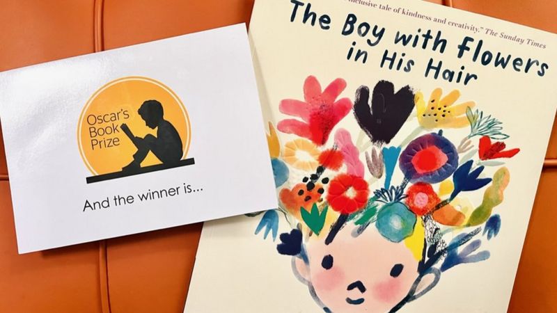 Salford-born children's author wins coveted book prize - BBC News