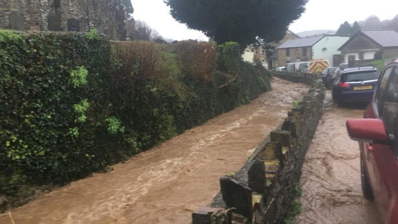 North Devon flooding: Homes evacuated after landslides hit - BBC News