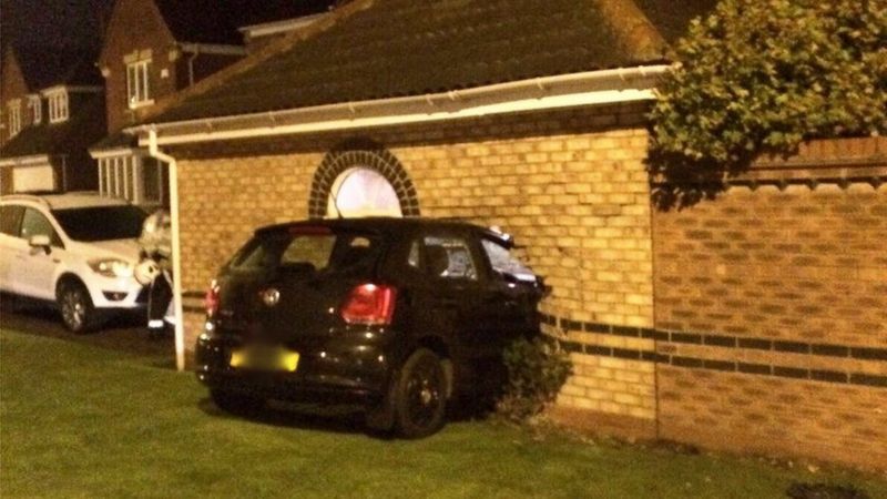 Driver smashes car through garage wall in Brownhills - BBC News