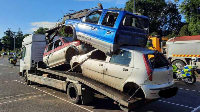 Vehicle carrier stopped by Norfolk Police for insecure load - BBC News