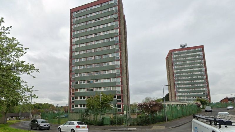 Belvoir: Windows and doors smashed in Belfast tower block - BBC News