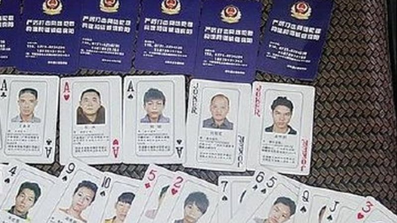 China: Police issue 'most wanted' playing cards - BBC News
