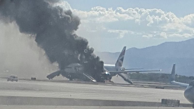 British Airways plane catches fire in Las Vegas - BBC News