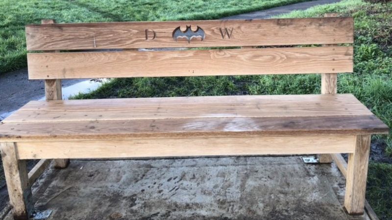 Godalming Batman park bench mystery finally explained - BBC News