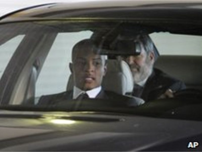 Rapper T.I. sent back to jail after LA drug arrest - BBC News