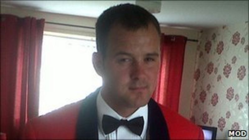 Kirkby soldier Mark Burgan honoured at Liverpool game - BBC News