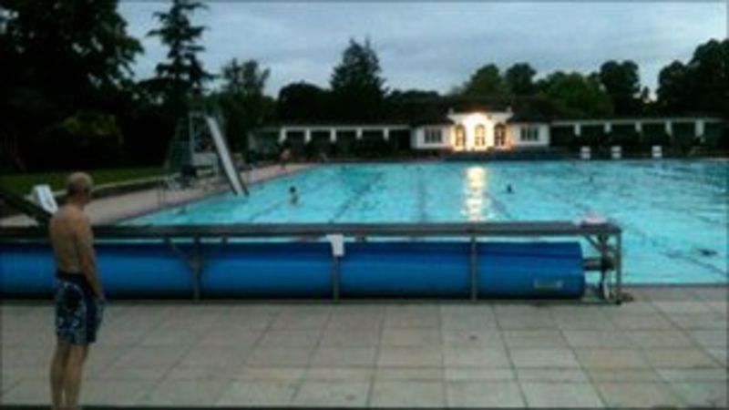 Summer solstice sunrise swim takes place in Cheltenham - BBC News