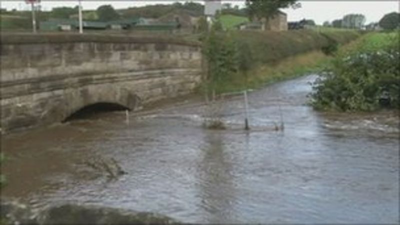 Flooding in Lancashire leads to travel disruption - BBC News