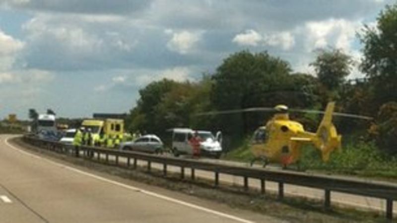 Lorry driver bailed over Suffolk A14 fatal crash - BBC News