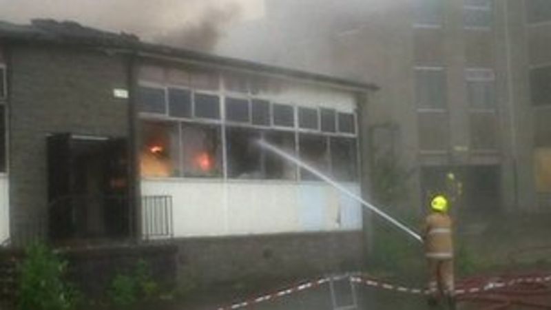 Crews battle fire at disused Bankhead Academy in Aberdeen - BBC News