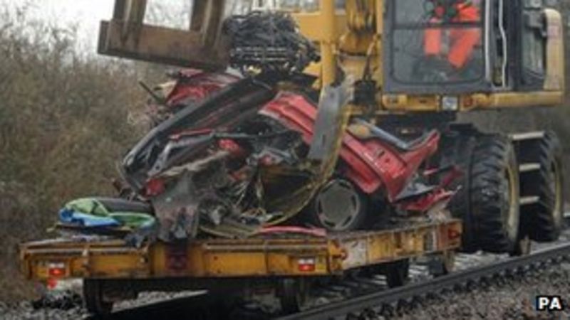 Level crossing crash: One dead as train hits car - BBC News