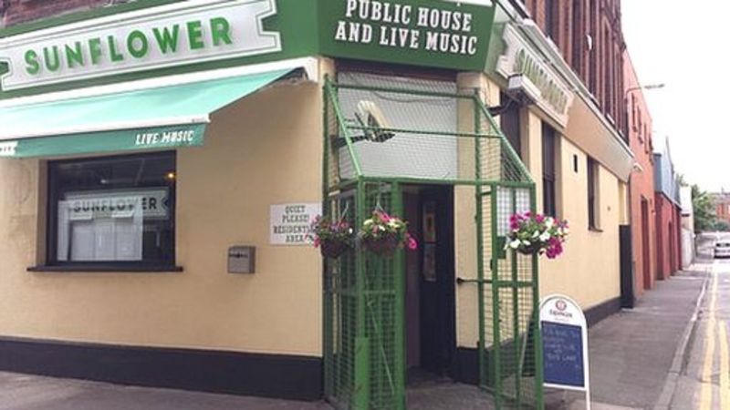 Belfast's Sunflower bar wants to keep cage - BBC News
