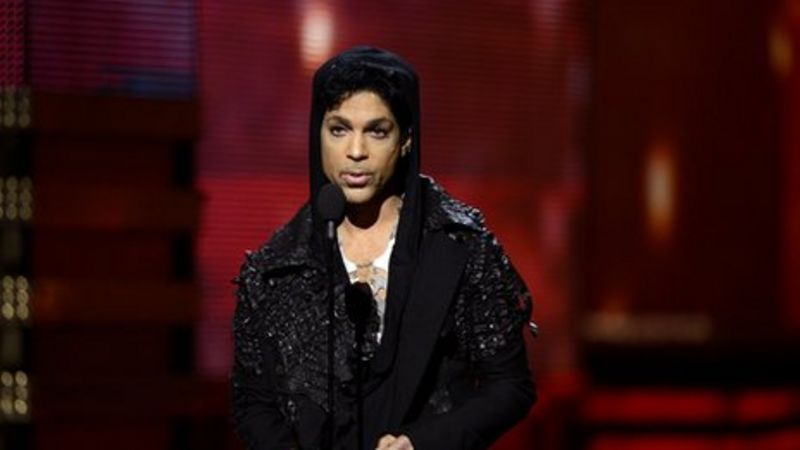 Prince re-signs with 'slave' label Warner Bros Records - BBC News