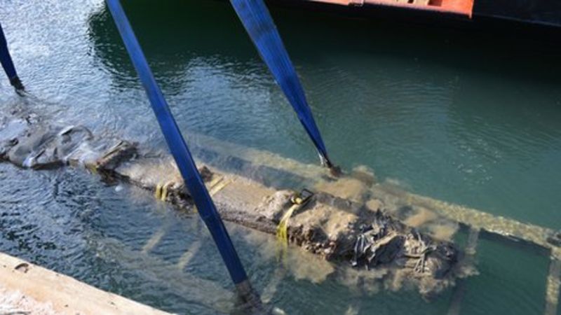 Poole Swash Channel Wreck: Rudder brought ashore - BBC News