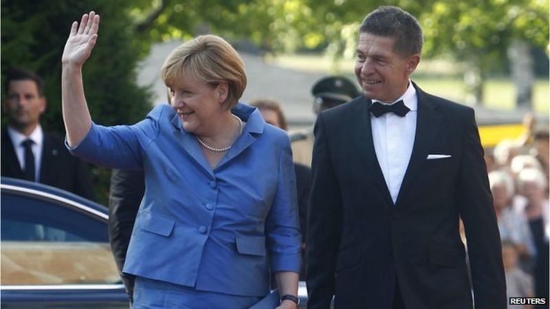 Semi-naked 'drug user' dances on Angela Merkel's jet - BBC News