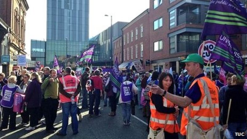 50,000 march in NHS cuts protest in Manchester - BBC News