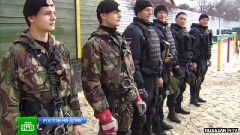 Russia: Riot police unit made up of identical twins - BBC News