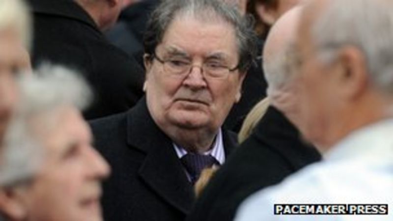 Funeral of Fr Alec Reid held in west Belfast monastery - BBC News