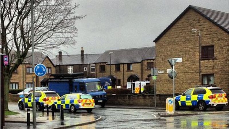 Armed police surround siege flat in Burnley as woman held - BBC News
