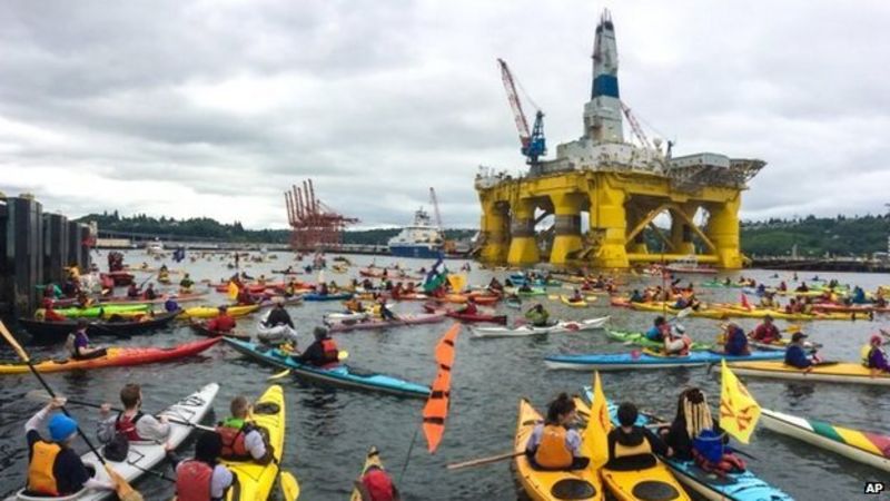 'Paddle in Seattle' Arctic oil drilling protest - BBC News