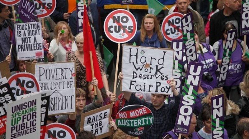 Manchester march: Large protest at Tory conference - BBC News