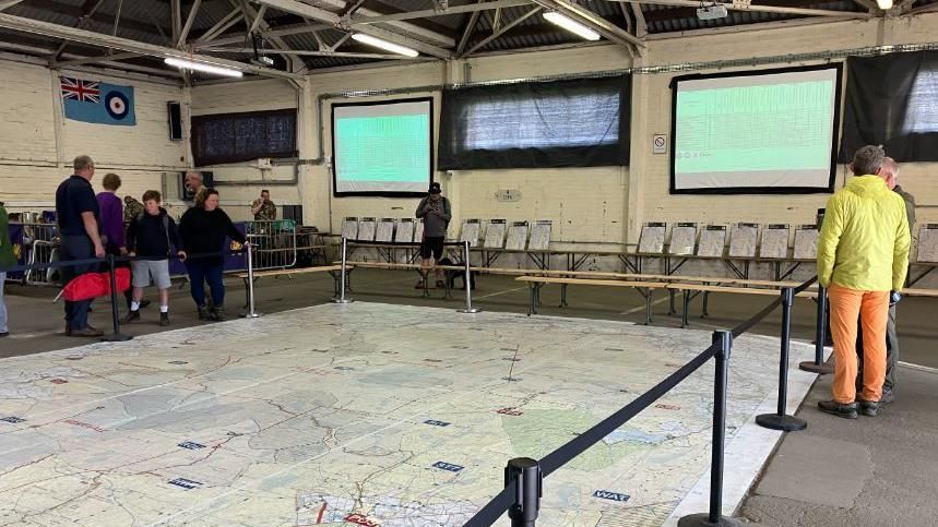 Ten Tors challengers cross the finish line on Dartmoor - BBC News