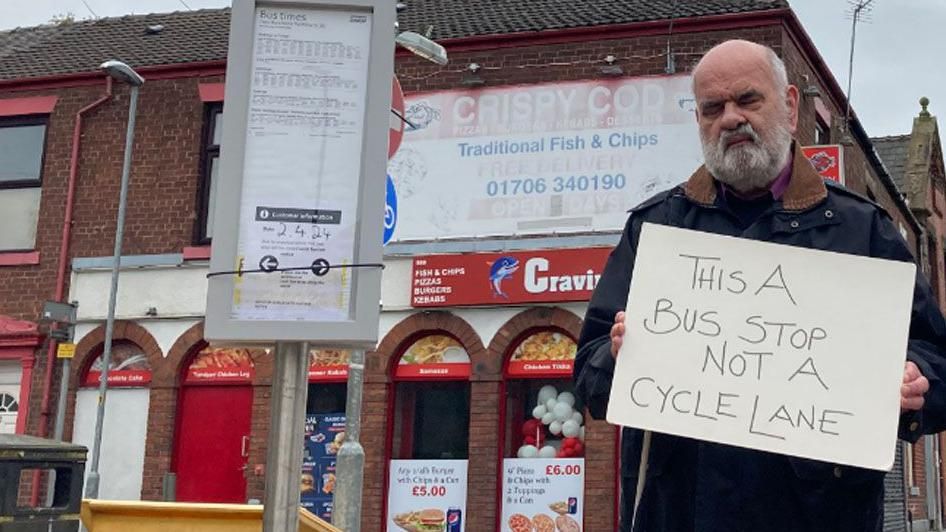 Blind man says new Castleton cycle lanes are 'dangerous' - BBC News