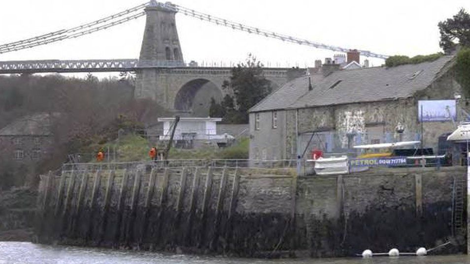 Menai Bridge's promenade centenary marked by parade - BBC News