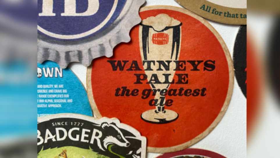Uphill man with collection of more than 900 beer mats - BBC News