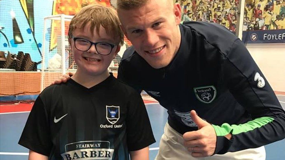 James McClean pitches in for kids with Down's syndrome - BBC News