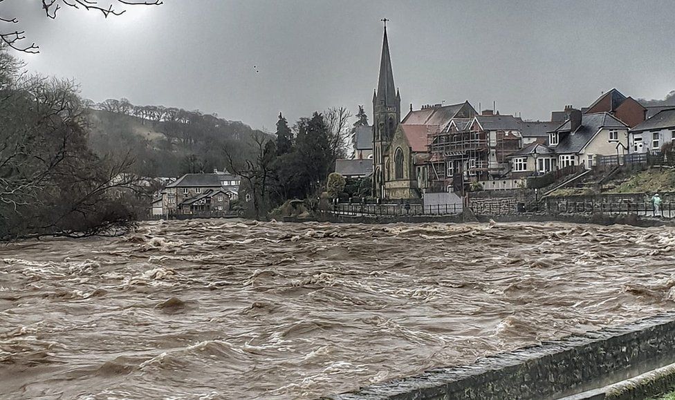 In pictures: Storm Dennis brings flooding to Wales - BBC News
