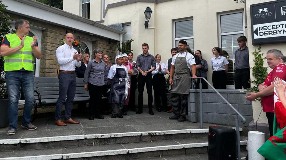 Asylum hotel: Protest against plans for Llanelli's Stradey Park - BBC News