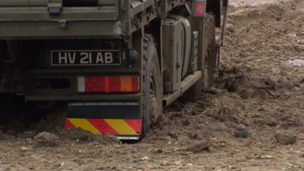 Farmer rescues bomb disposal truck stuck at Mappleton beach - BBC News