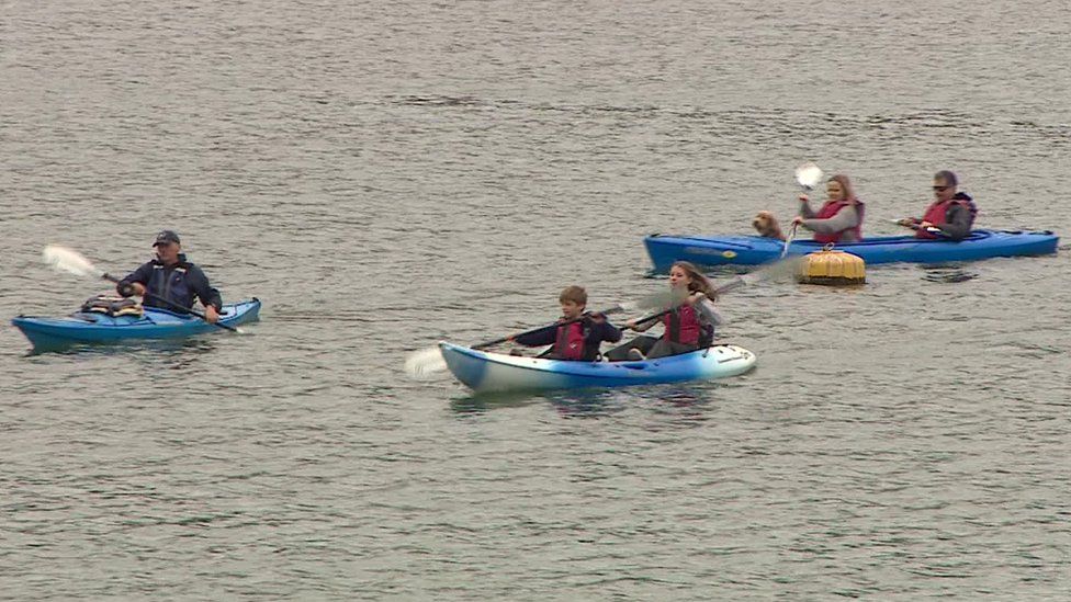 Kayak and stand-up paddleboarding rescues soar - BBC News