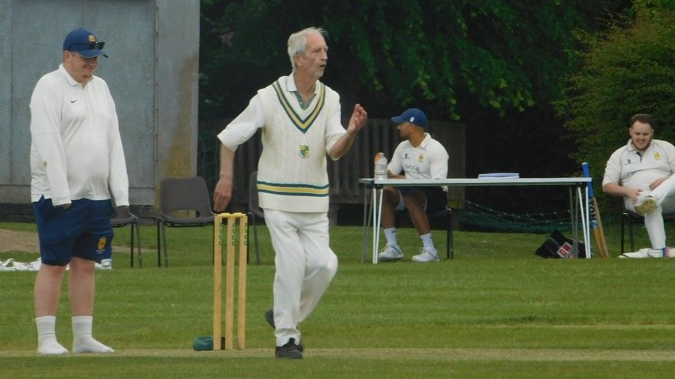 Village cricket side fields players aged 7 and 77 - BBC News