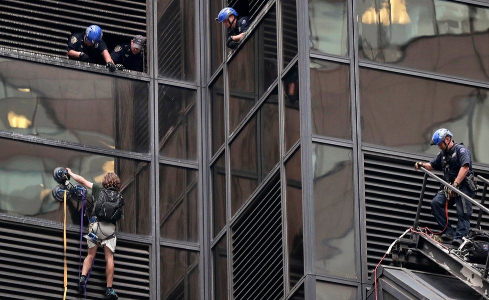 New York police arrest man trying to climb Trump Tower - BBC News
