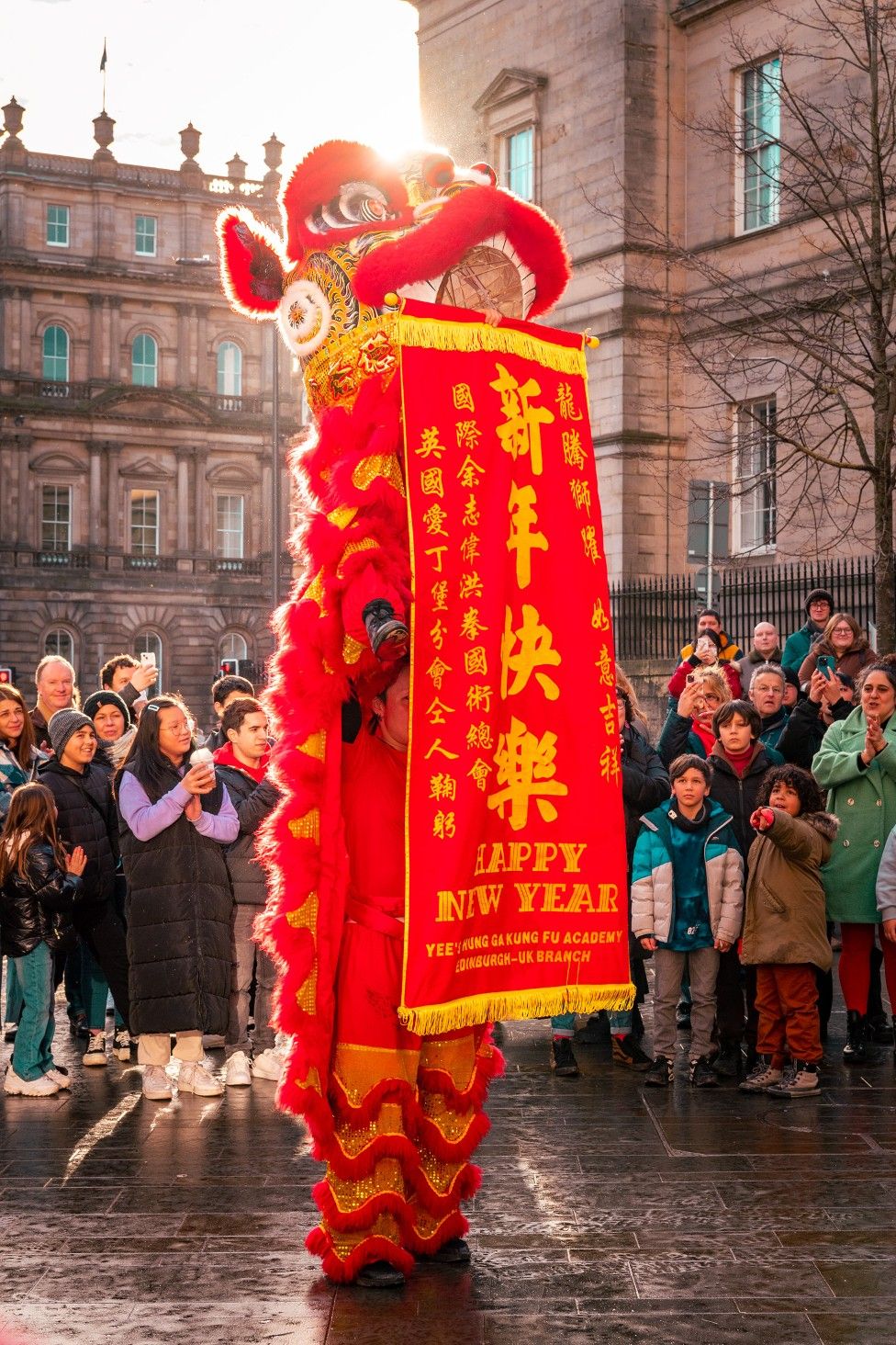 Lion dance kicks off Chinese New Year in Scotland - BBC News