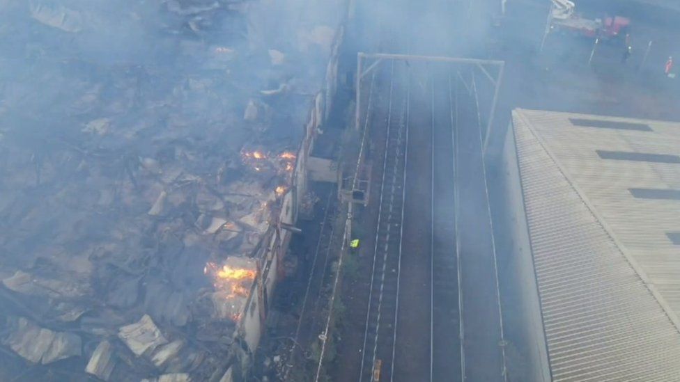 Wolverhampton railway reopens after major fire at factories - BBC News