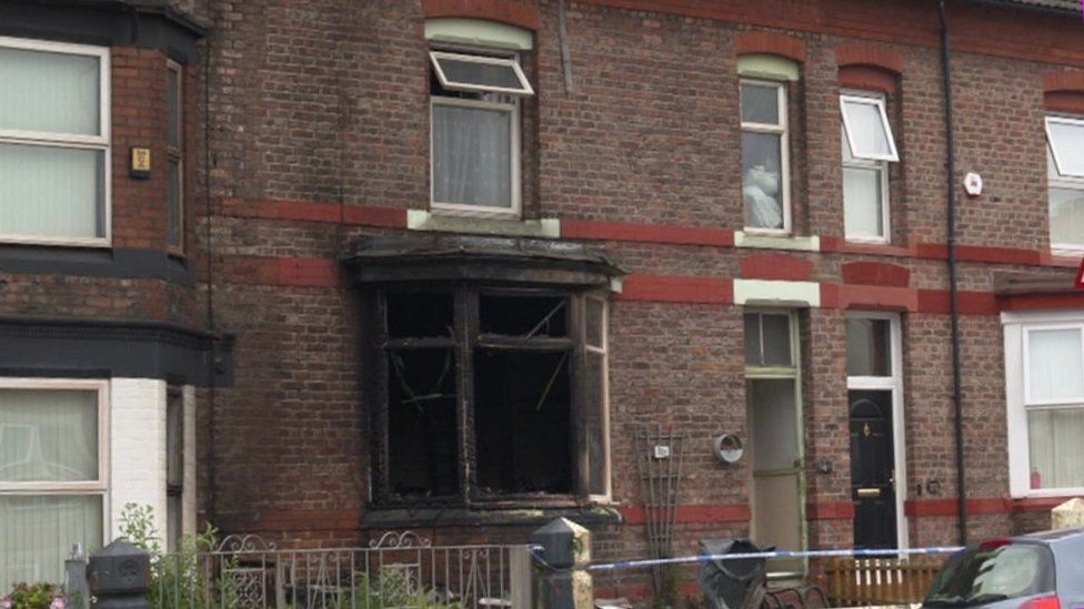 Birkenhead residents rescued after suspected arson attack - BBC News
