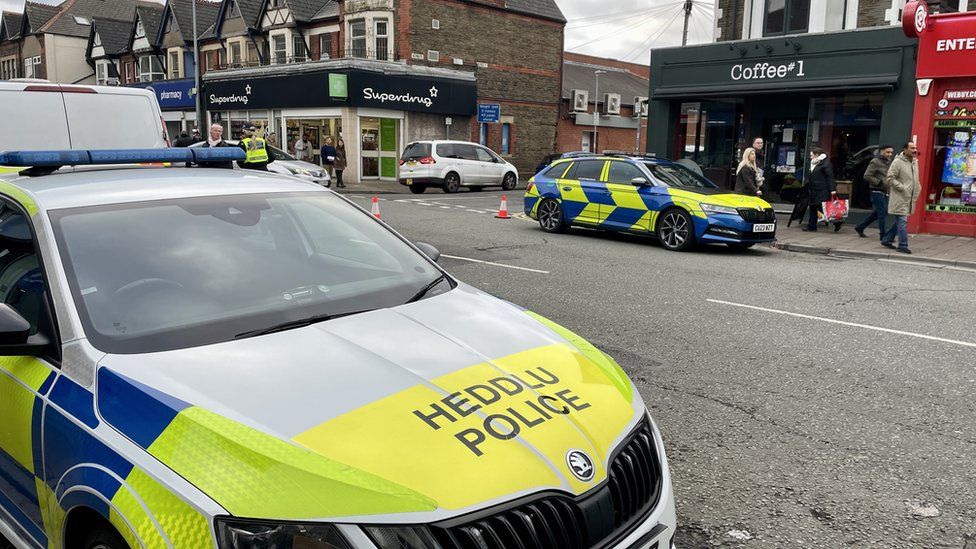 Cardiff crash: Dangerous driving arrests after woman injured - BBC News