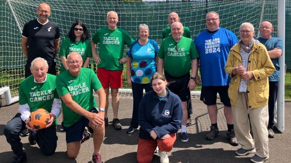 Cancer walking football group helps patients 'overcome' problems - BBC News