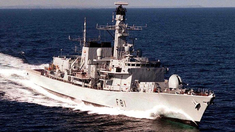 Kayakers safe after warship joins rescue efforts - BBC News