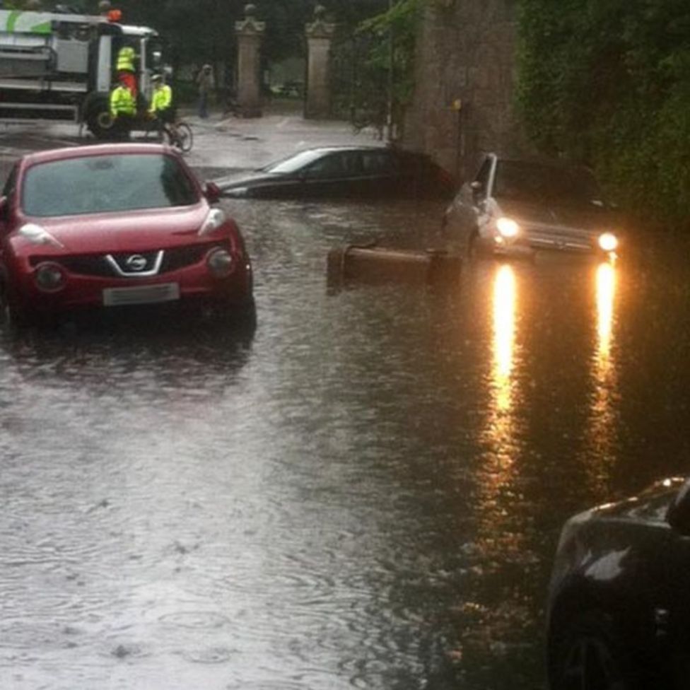 Torrential rain causes flooding in Aberdeen - BBC News