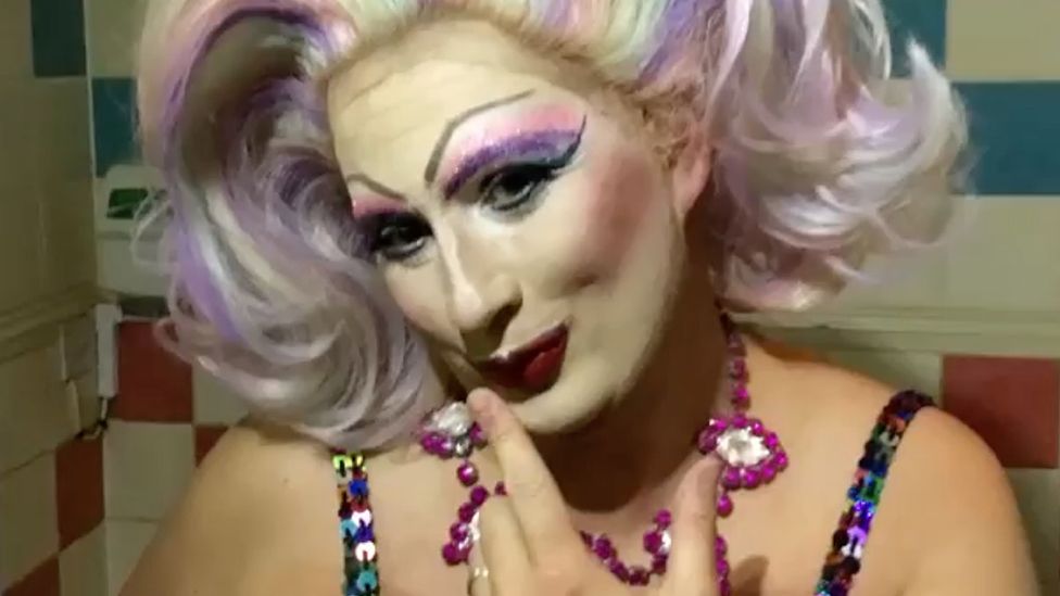 Drag queen head teacher backed by school - BBC News