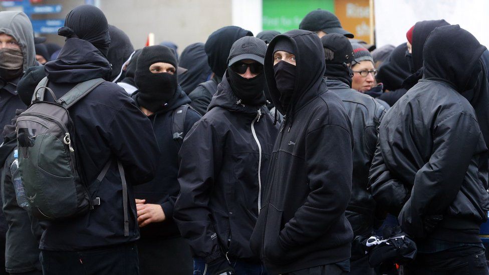 Police continue Dover violent protest probe one year on - BBC News