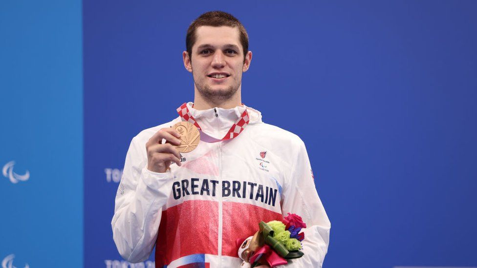 Reece Dunn: Paralympic swimmer 'shocked' to get MBE - BBC News