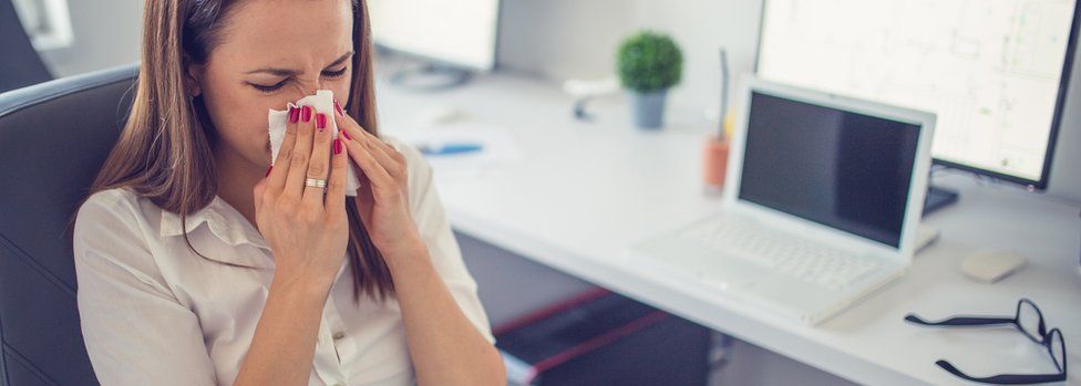 UK workers' sickness rates at record low - BBC News