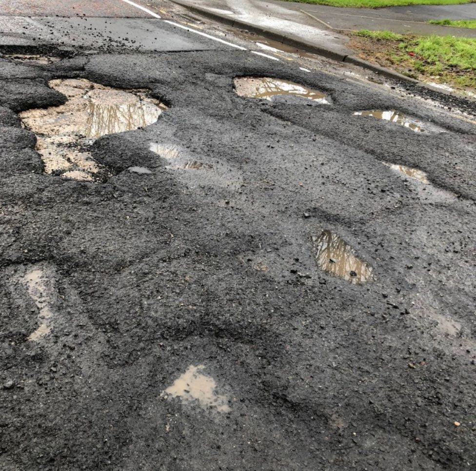Pothole photos: Your pictures of crumbling roads - BBC News