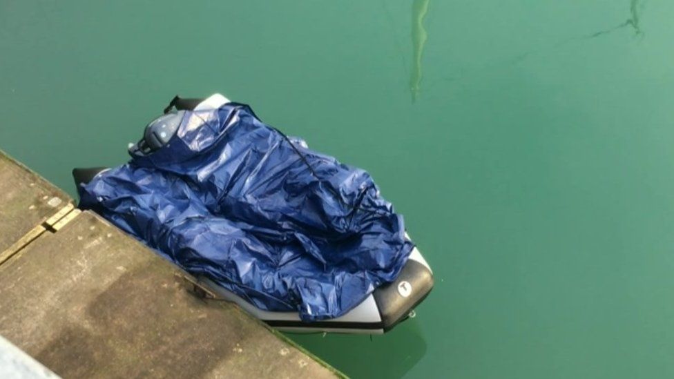 Toddler among nine rescued from dinghy off Dover coast - BBC News